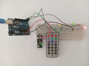 Remotely light up two LEDs by remote control using KY-032 sensor and Arduino UNO